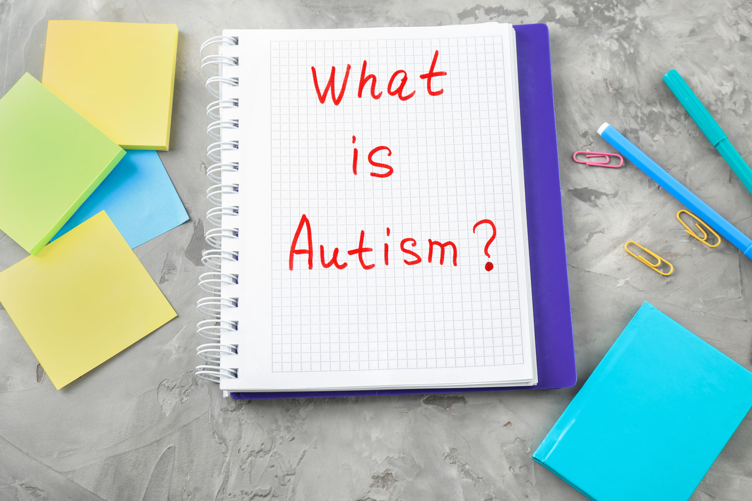 Notepad with text WHAT IS AUTISM? on grey background - Buffalo Healthy ...